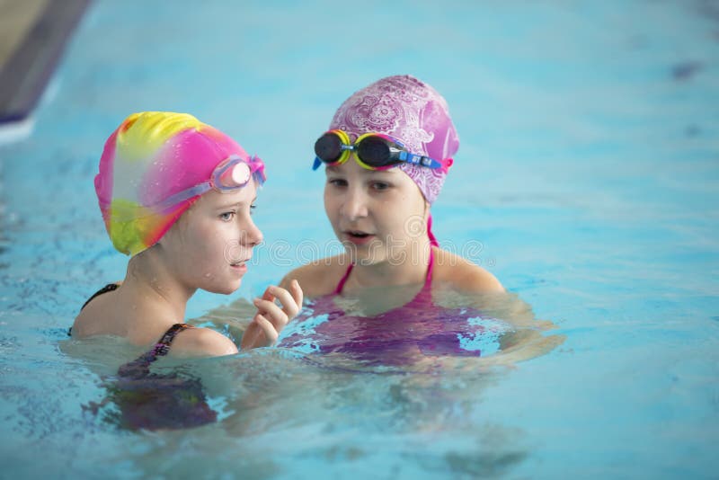 Children in the pool stock image. Image of activity - 222777233