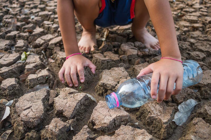 Children Pour Water on the Arid Ground. Stock Photo - Image of asia ...