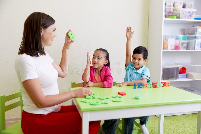 Children Practice Correct Pronunciation with Speech Therapist Stock ...