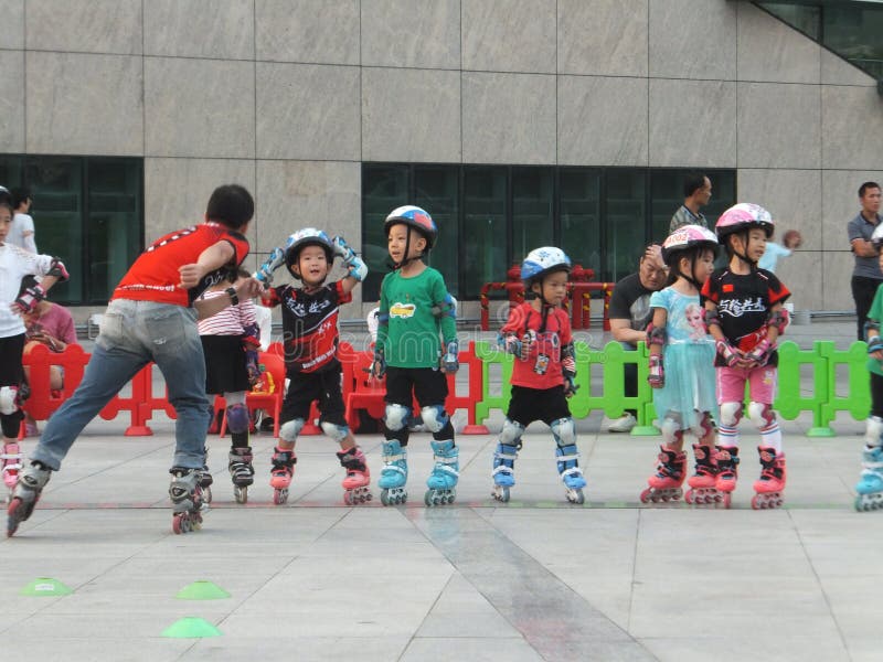 The Children Practice Roller Skating in the Square on Weekends ...