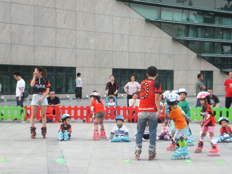 The Children Practice Roller Skating in the Square on Weekends ...