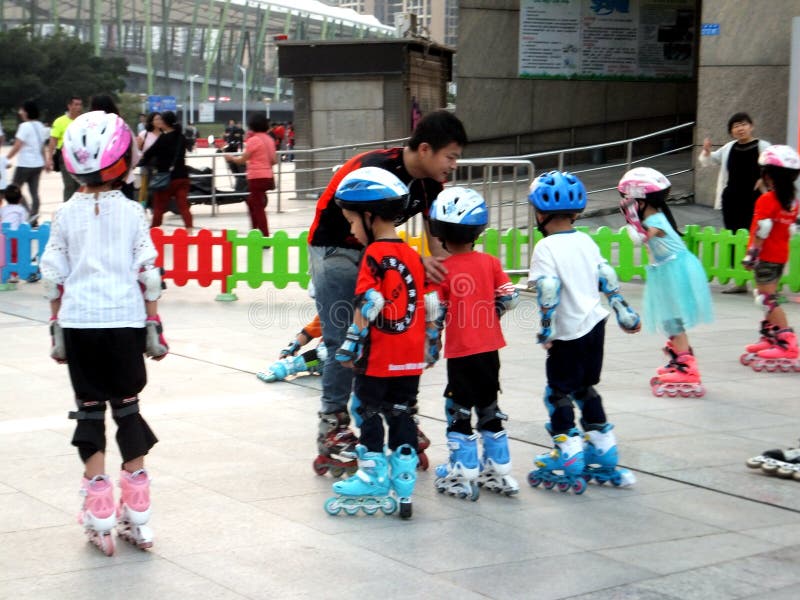 The Children Practice Roller Skating in the Square on Weekends ...