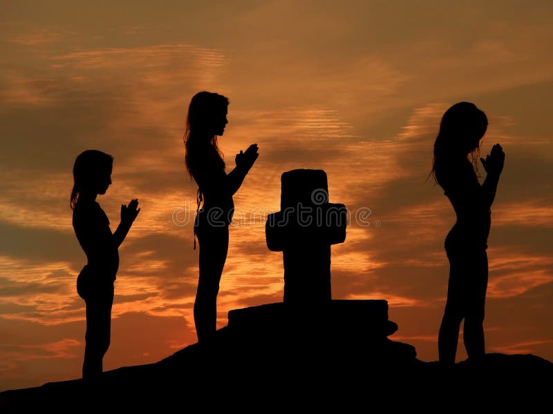Children praying at sunset stock image. Image of landscape - 13590333