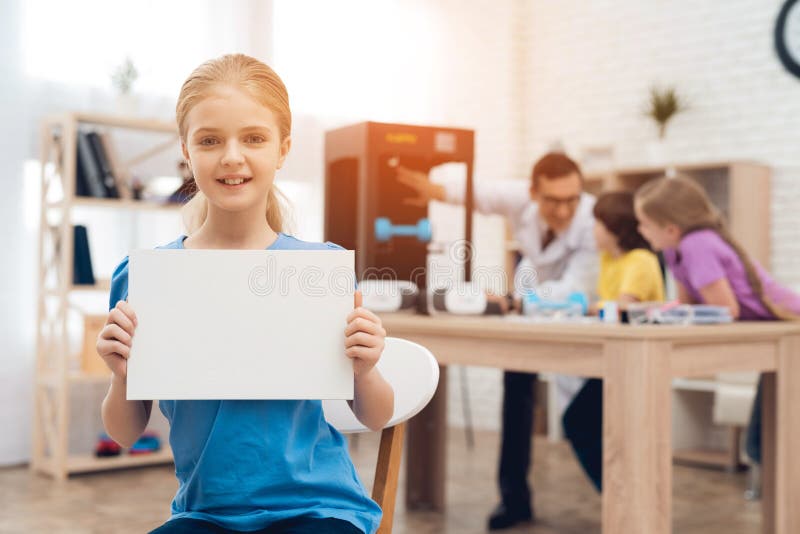 Children Print Different Items on a 3d Printer with a Teacher. Stock ...