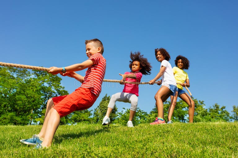 Children Pull Rope - Competitive Fun Game in Park Stock Photo - Image ...