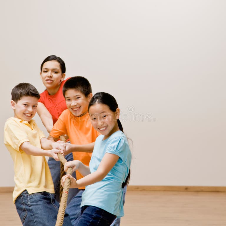Children Pulling on Rope in Tug-of-war Stock Image - Image of ...