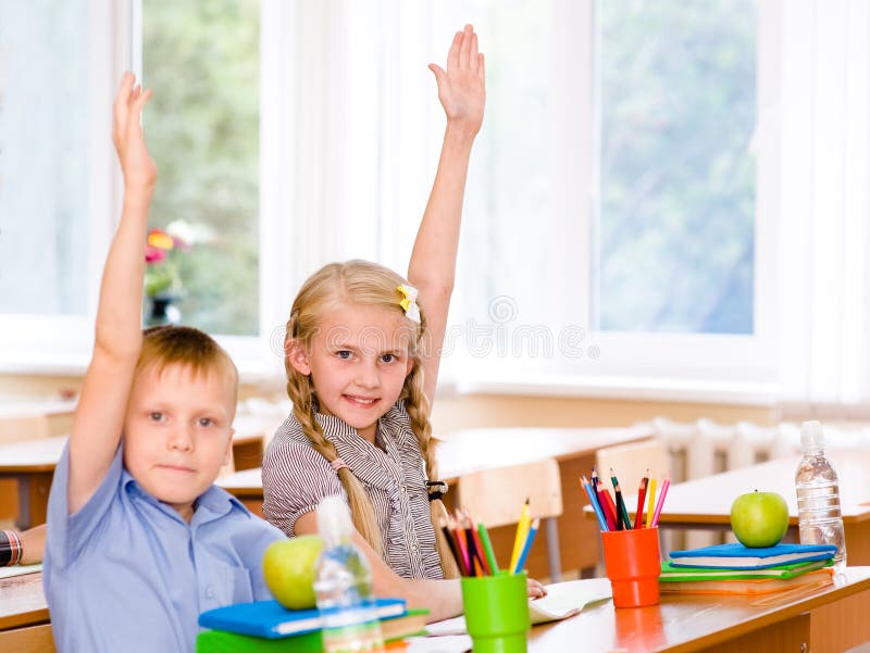 Children Raising Hands Knowing the Answer To the Question Stock Image ...