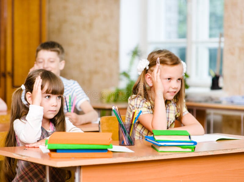 Children Raising Hands Knowing the Answer To the Question Stock Image ...