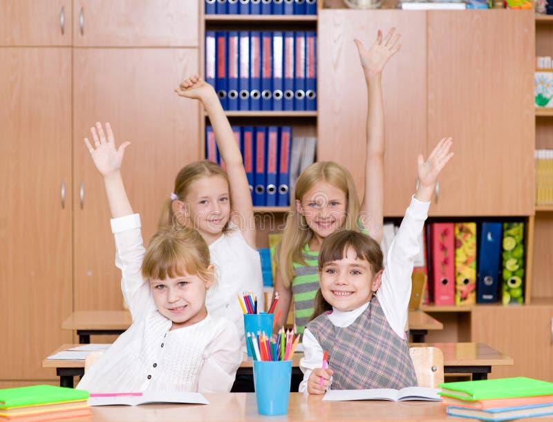Children Raising Hands Knowing the Answer To the Question Stock Image ...