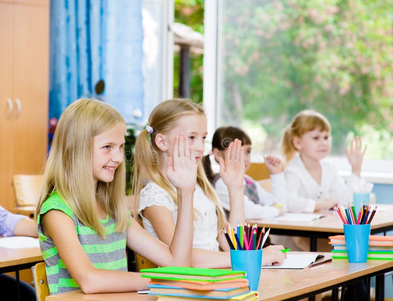 Children Raising Hands Knowing the Answer To the Question Stock Image ...