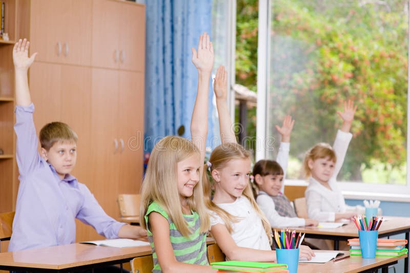 Children Raising Hands Knowing the Answer To the Question Stock Image ...