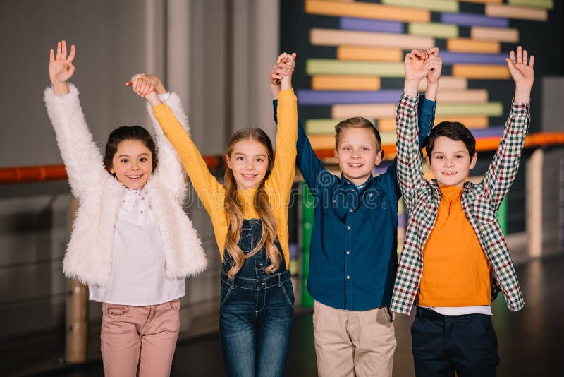 Children Raising Hands Up and Stock Photo - Image of group, boys: 155852816