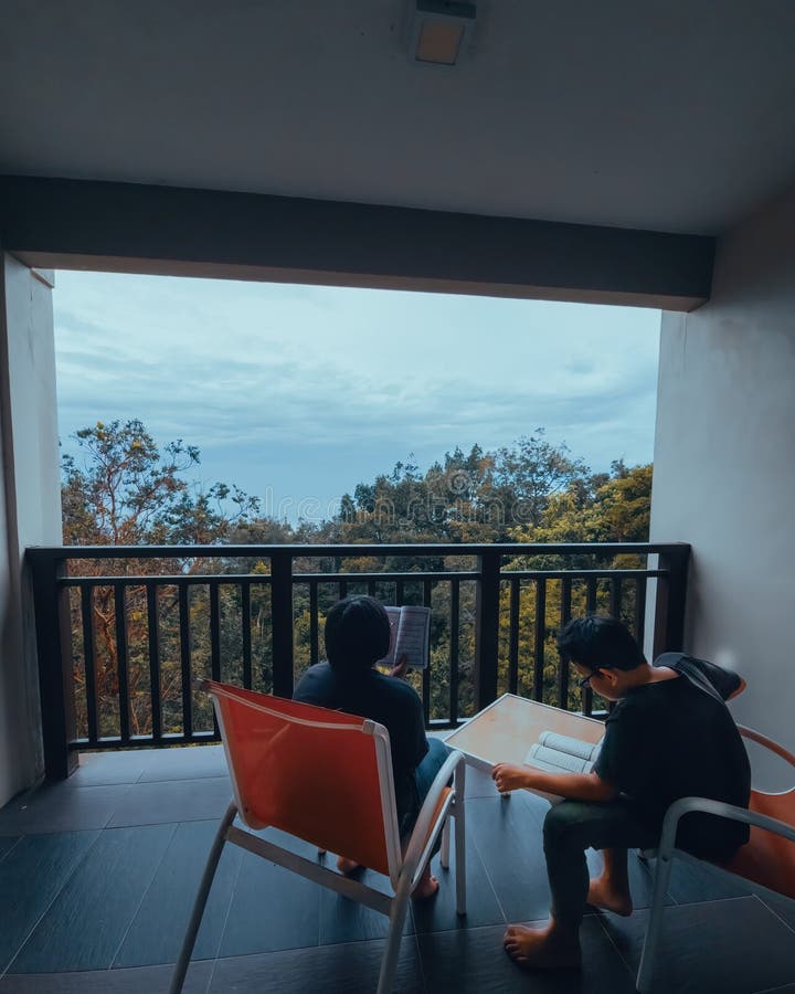 Children Reading at the Balcony while Enjoying the View of the Forest Stock Photo - Image of ...