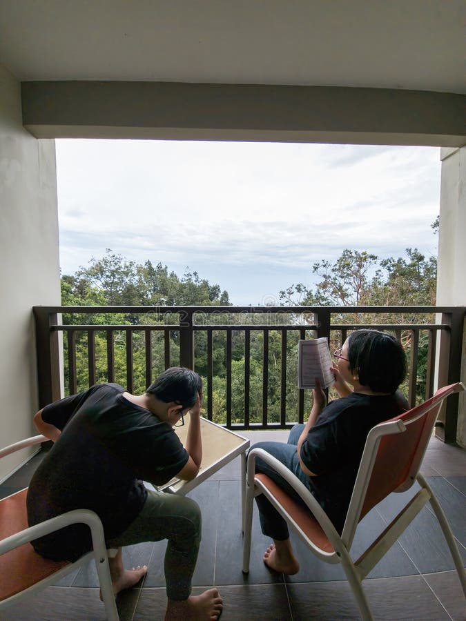 Children Reading at the Balcony while Enjoying the View of the Forest Stock Image - Image of ...