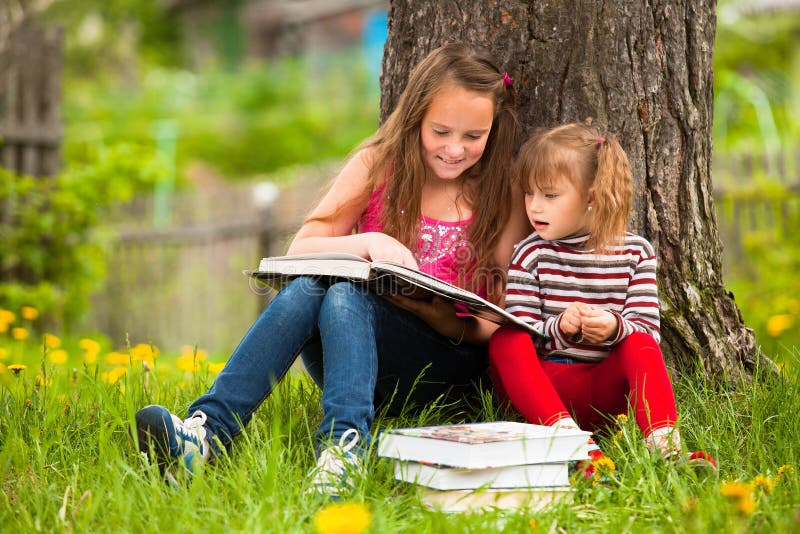 Children reading the book stock photo. Image of learn - 25266694