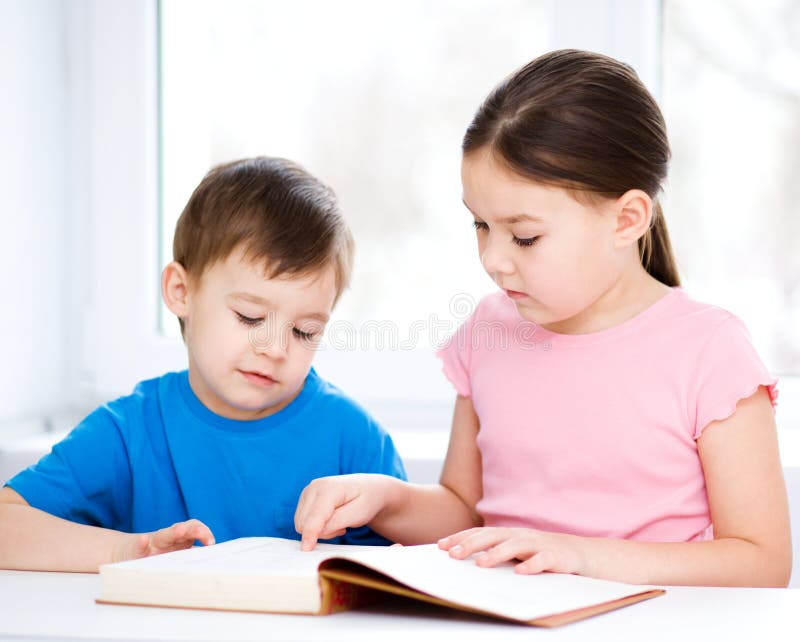 Children is reading book stock image. Image of care, child - 37481277