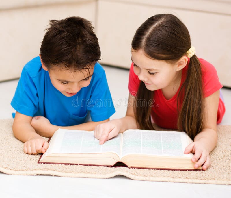 Children is reading book stock image. Image of child - 37664325
