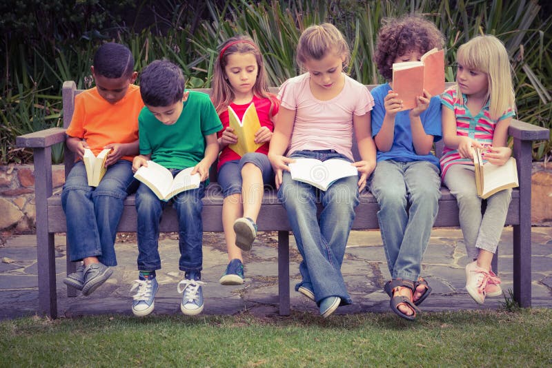 Children Reading from Books Together Stock Photo - Image of green ...