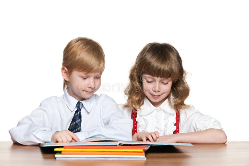 Children are Reading at the Desk Stock Photo - Image of children ...