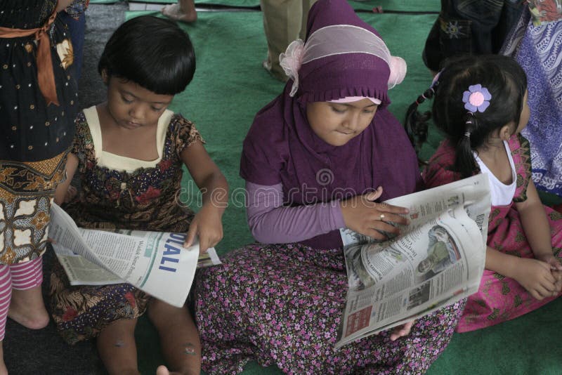 Children Reading a Newspaper on a National Press Editorial Photography ...