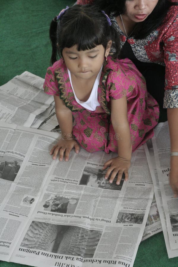 Children Reading a Newspaper on a National Press Editorial Image ...