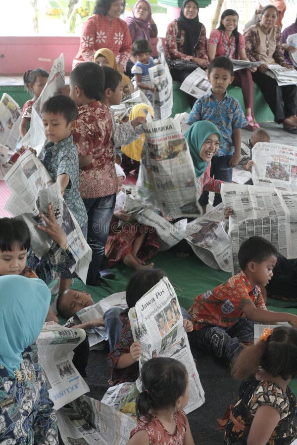 Children Reading a Newspaper on a National Press Editorial Photography ...