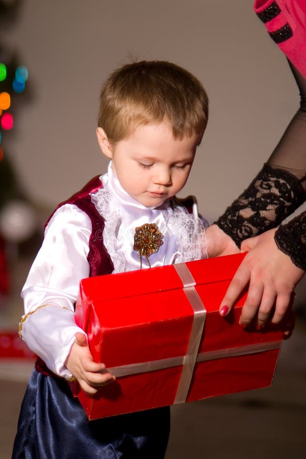 Children with red gift box stock photo. Image of interior - 34433946