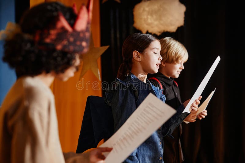 Children Rehearsing Play with Scripts Objects in Hand Stock Image ...