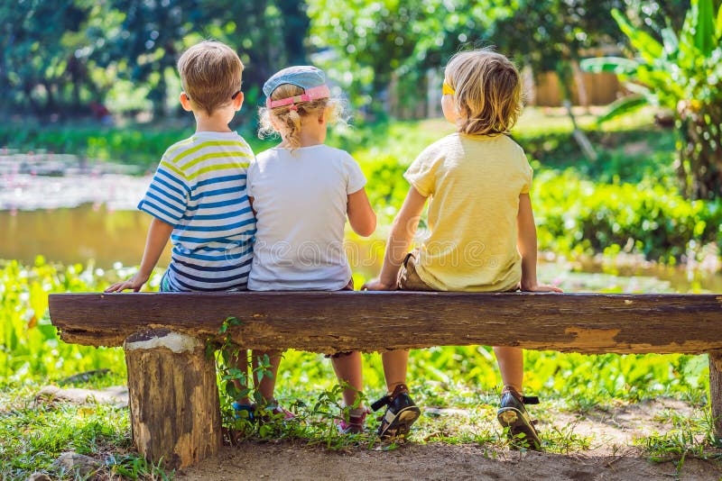 Children Rest during a Hike in the Woods Stock Photo - Image of girl ...