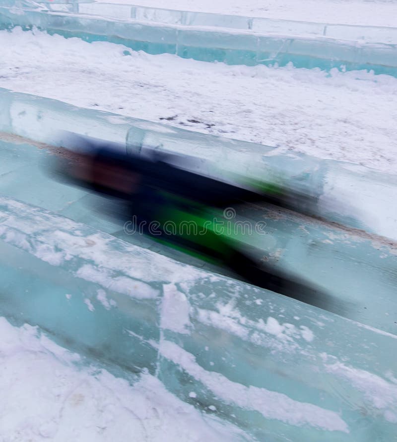 Children Ride a Slide on Ice in the Park Stock Photo - Image of sledge ...