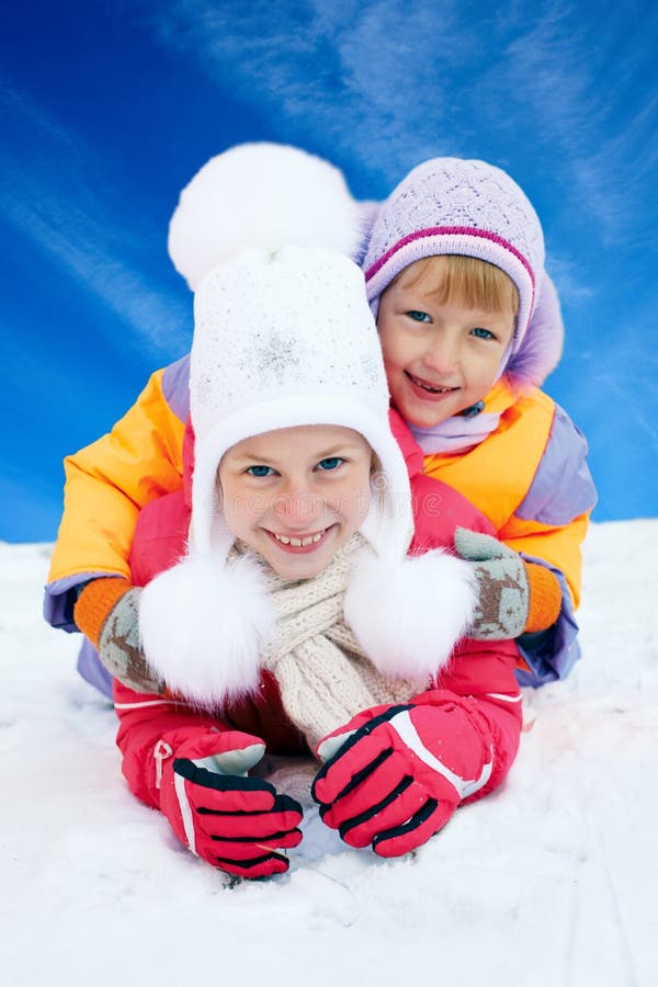 Children Ride from the Snow Slide. Winter Fun Stock Photo - Image of ...