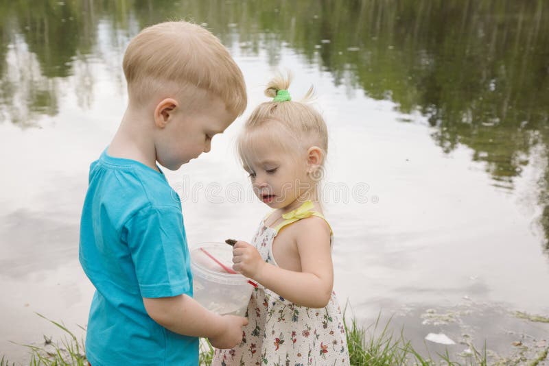Children on a River in a Forest Catch Fish Stock Image - Image of ...