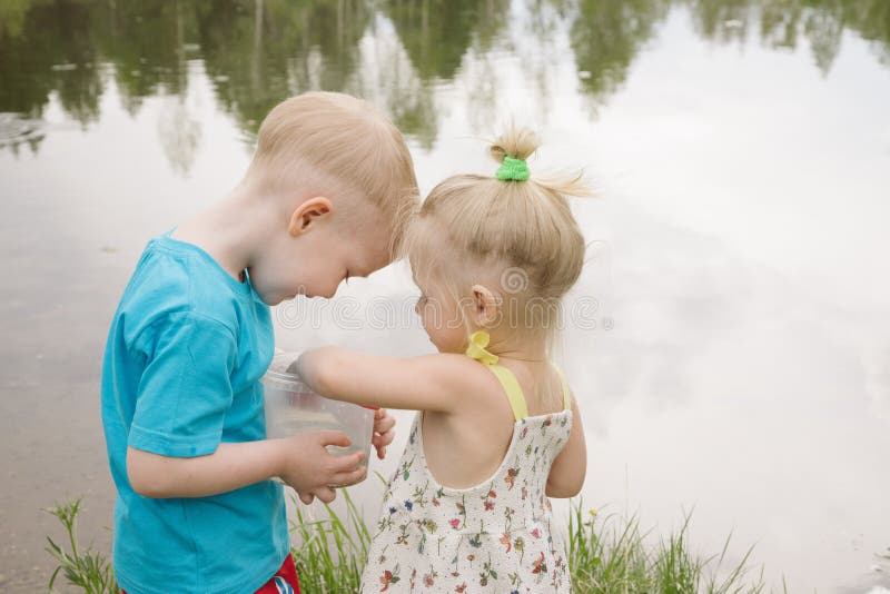 Children on a River in a Forest Catch Fish Stock Image - Image of ...