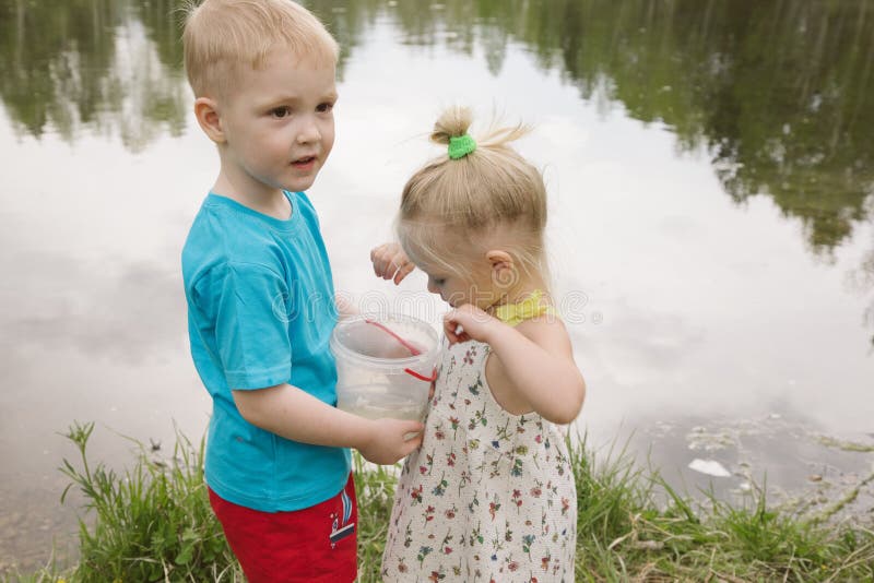 Children on a River in a Forest Catch Fish Stock Image - Image of fish ...
