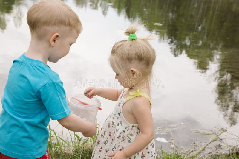 Children on a River in a Forest Catch Fish Stock Image - Image of group ...