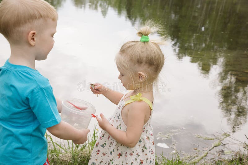 Children on a River in a Forest Catch Fish Stock Image - Image of ...