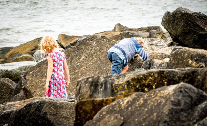 Children Rock Climbing at the Beach Editorial Stock Photo - Image of ...