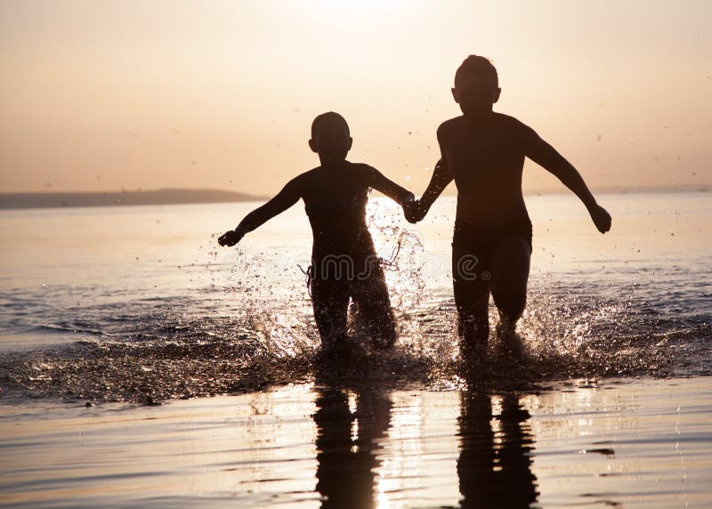 Children Run Along the Water at Sunset Stock Image - Image of leisure ...