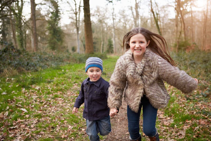 Children Running Along Path in Countryside Together Stock Photo - Image ...