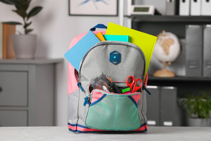 Children`s Backpack with Different School Stationery on Table Indoors ...