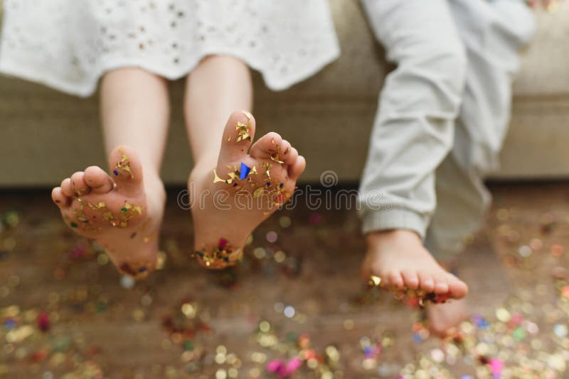 Children`s Bare Feet with Confetti on Their Feet Stock Photo - Image of ...