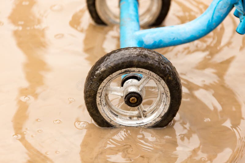 Children's Bicycle Wheels Puddle Road Stock Photos - Free & Royalty ...