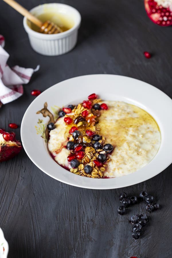 The Children`s Breakfast Oatmeal with Berries and Nuts Stock Image ...