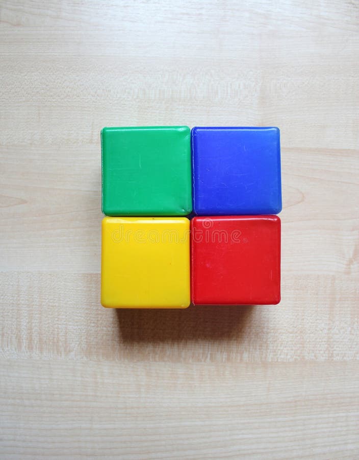 Children`s Bright Cubes on a Light Wooden Floor Stock Image - Image of ...
