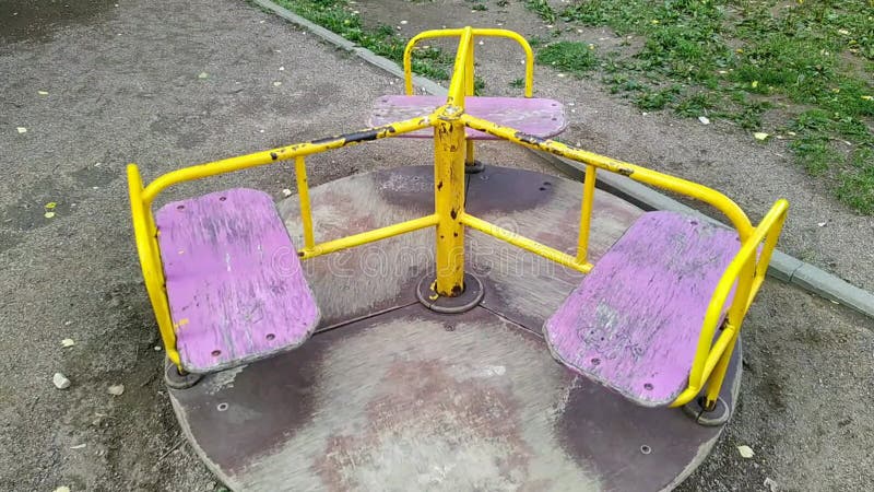 Children S Carousel is Spinning on the Playground. Stock Footage ...