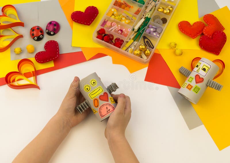 Children S Crafts Robot Paper and Cardboard. the Kid Shows a Master ...