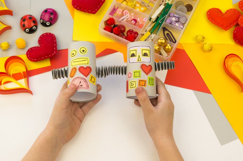 Children S Crafts Robot Paper and Cardboard. the Kid Shows a Master ...