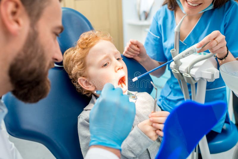 Children`s Dental Procedure Stock Photo - Image of caucasian ...