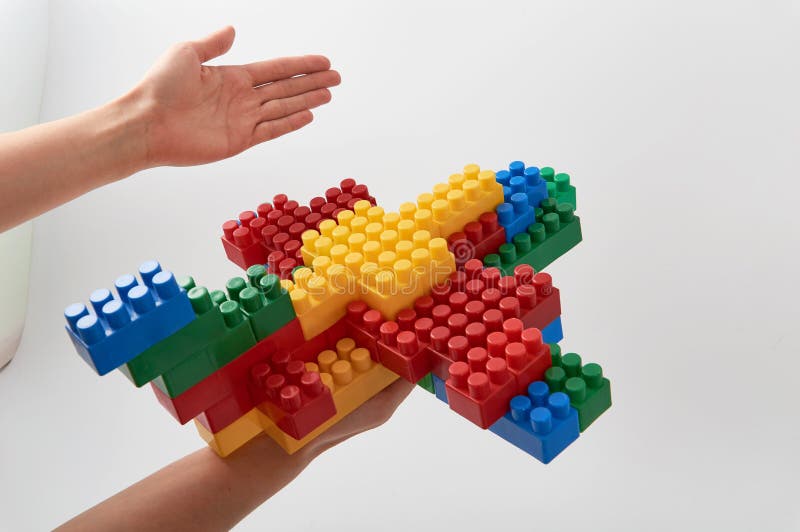 Figures from a Colored Cubes Designer on a White Background Stock Image ...