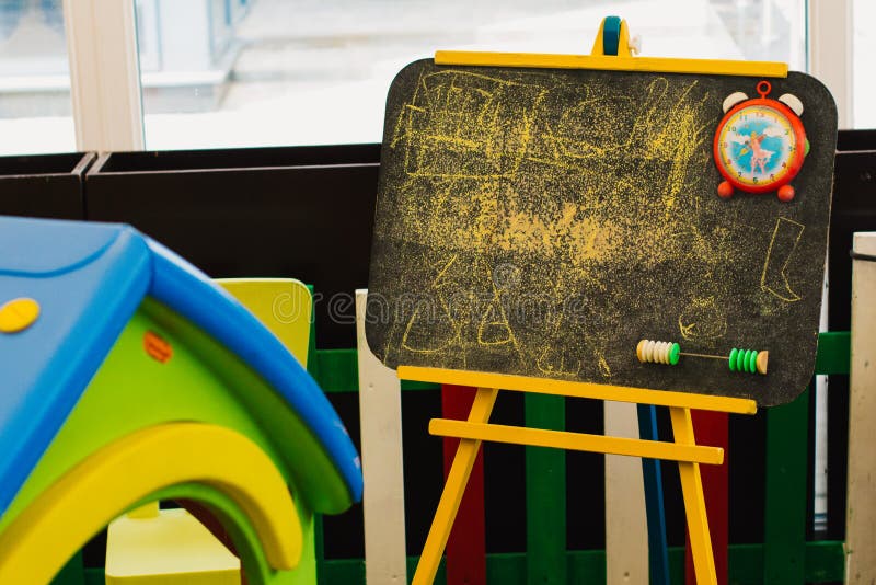 Children`s Drawing Board with a Clock in the Children`s Room Stock ...